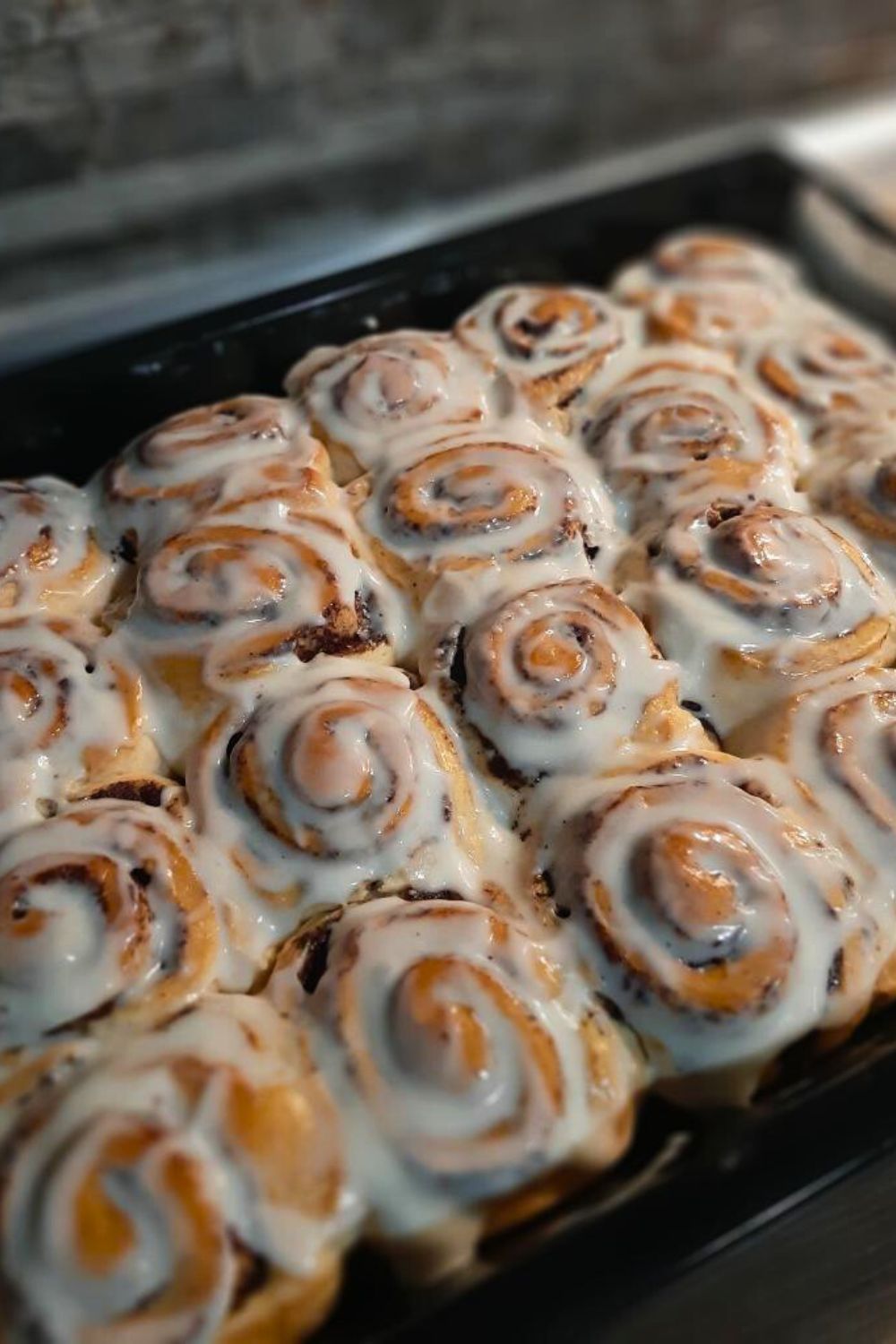 Loaded Cinnamon Rolls with Toasted Pecans & Icing
